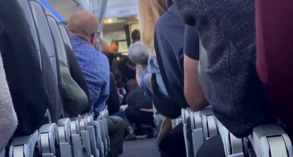 American Airlines Flight Attendant Hits Unruly Passenger with Coffee ...