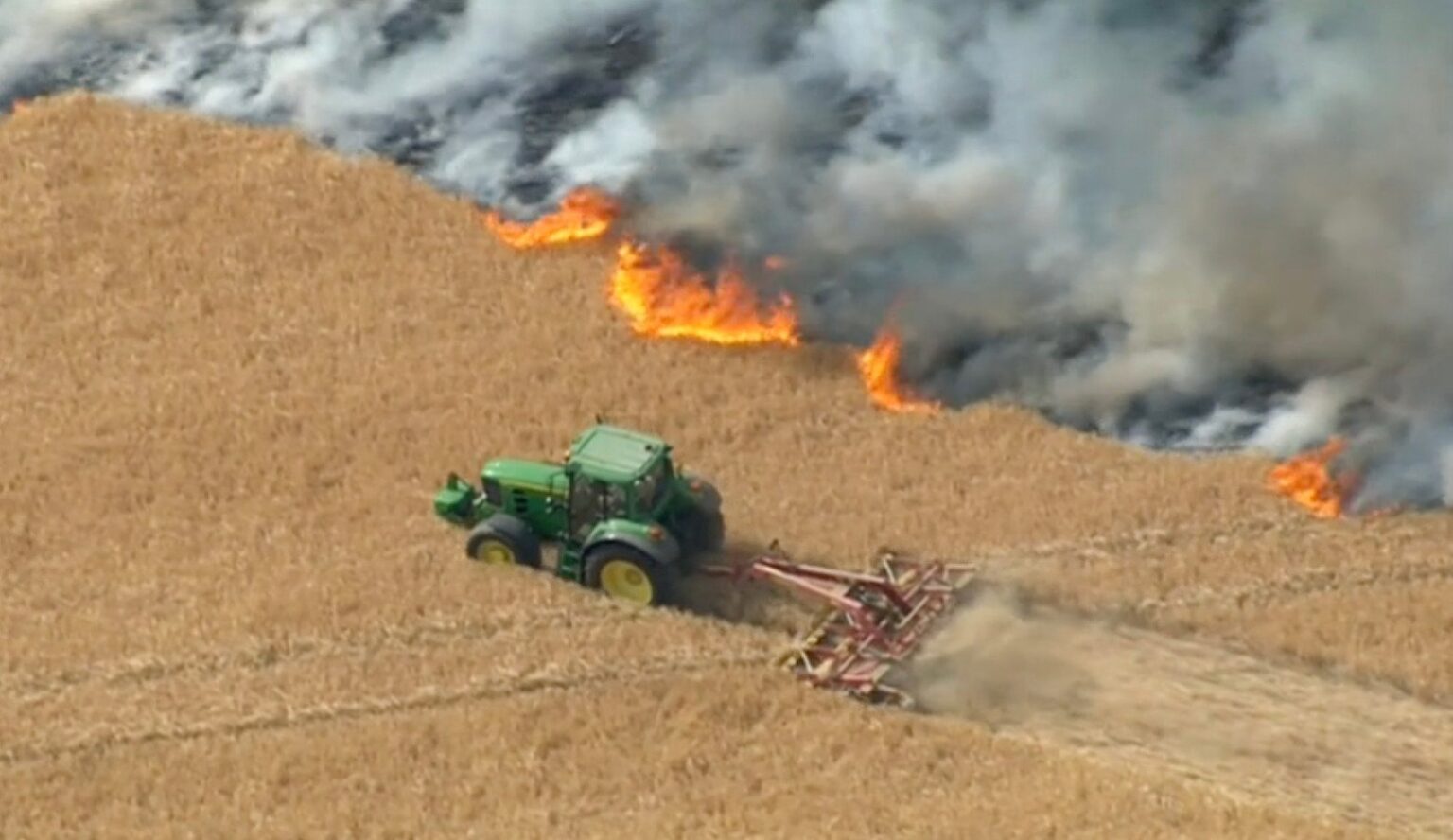 Watch: Hero Farmer Sees Massive Crop Fire – Gets in His Tractor and ...